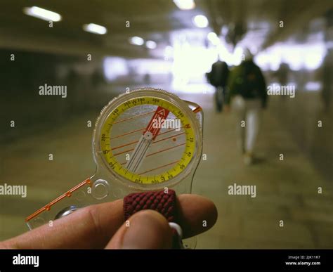 A Compass In A Persons Hand Orient Yourself In The Current Situation