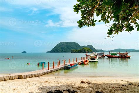 Plastic Floating Bridge Extends Into The Sea With Speed Boat 11073519