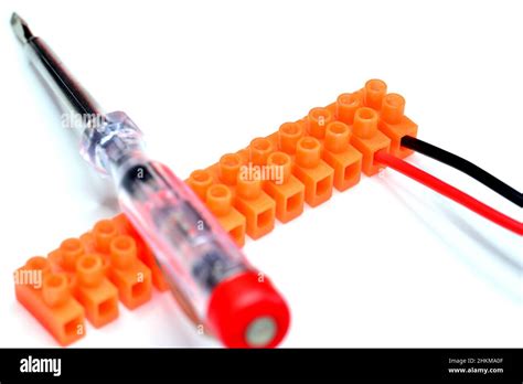 Terminal Block With Fixed Plus And Minus Cables And Screw Driver Stock Photo Alamy