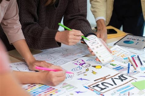 Premium Photo Creative Digital Development Agency Brainstorming About Mobile App Interface