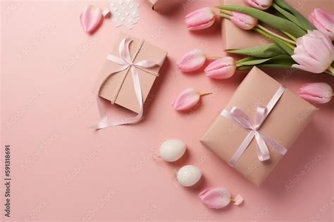 파스텔 핑크 바탕에 편지와 작은 하트가 있는 리본 핑크와 흰색 튤립 봉투가 있는 선물 상자 배경 인공지능 생성