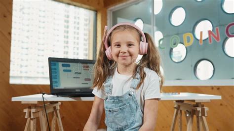 Cute Caucasian Girl Smile At Camera While Laptop Show Coding Screen Erudition Stock Footage