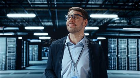 successful data center it specialist using tablet computer server farm