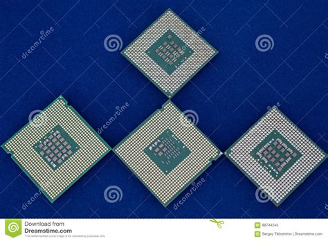 Four Computer Chip On The Blue Background Stock Image Image Of Green Industry