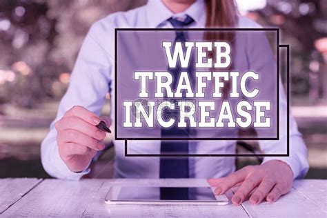 显示web流量增加的文本符号商业照片展示将网站访客扩展到网站的访问次数女商务人士坐在高清图片下载 正版图片503741799 摄图网