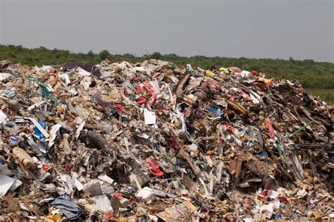 Premium Photo Heap Of Garbage On Field