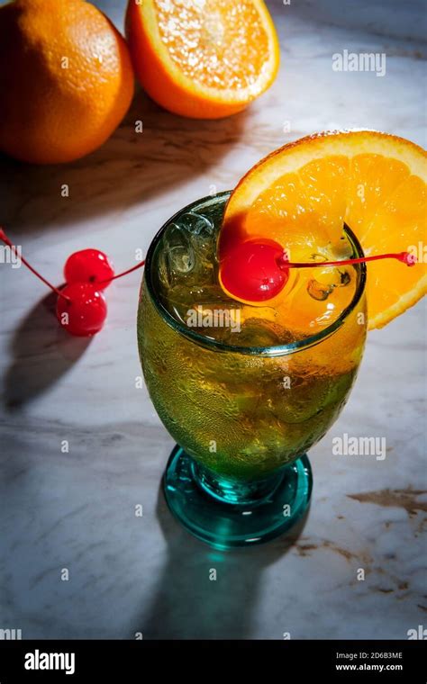 Old Fashioned Whiskey Cocktail On The Rocks With Orange Slice And