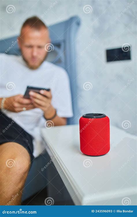 Male Testing Talking Smart Wireless Speaker Man Controlling Home Devices With A Voice Commands