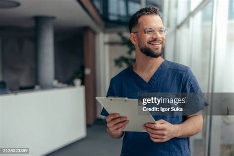 Male Nurse Assistant Photos And Premium High Res Pictures Getty Images