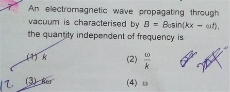 An Electromagnetic Wave Propagating Through Vacuum Is Characterised By B