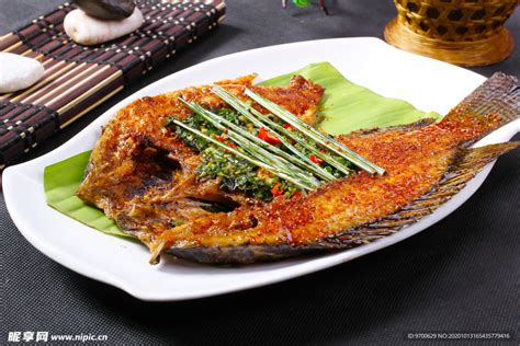 傣味烤罗非鱼摄影图 传统美食 餐饮美食 摄影图库 昵图网