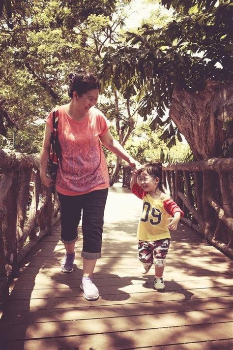Mother And Daughter Enjoying At Park Travel On Vacation Stock Image