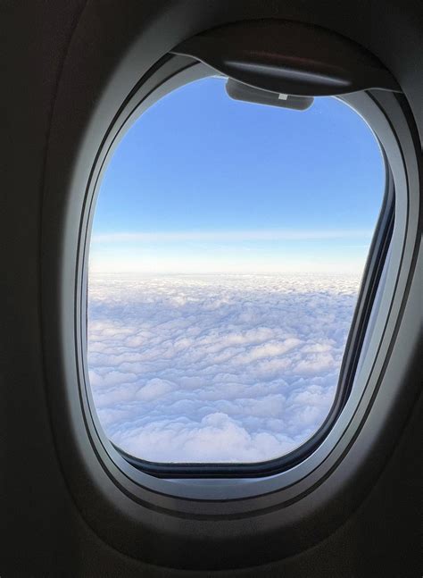 View From The Airplane Window Beautiful Cloudscape With Blue Sky Wonderful Panorama Above