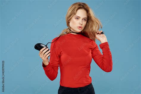 Pretty Woman In Red Sweater Joystick Controller Set Top Box Blue Background Stock Photo Adobe Pretty Woman In Red Sweater Joystick Controller Set Top Box Blue Background Stock Photo Adobe