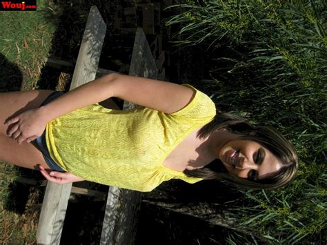 Amazing Brunette Babe Shows Her Hard Nipples Under A Yellow Shirt 15 Photos