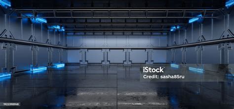전시실 파란색 Led가 켜집니다 콘크리트 차고 미래지향적인 복도 격납고 투광 조명으로 조명되는 디자인을 위한 콘크리트 격납고 미래 지향적인 배경입니다 미래지향적인 연단 3d