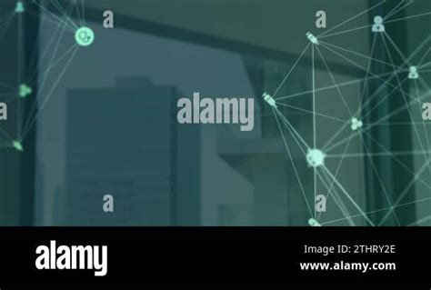 animation of connected icons forming globes over glass window against buildings in background