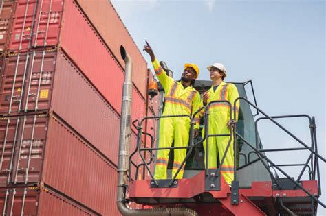 Engineer Man Team In Safety Gear Control Containers Box At Container Cargo Container Yard