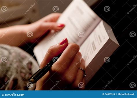 Close Up Of A Woman Hands Taking Notes In A Book While Studying At Home Stock Photo Image Of