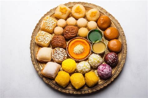 A Plate Of Different Types Of Sweets Including A Chocolate And Candy