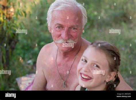 Grandfather Have Fun With Granddaughter Joyful Grandfather And