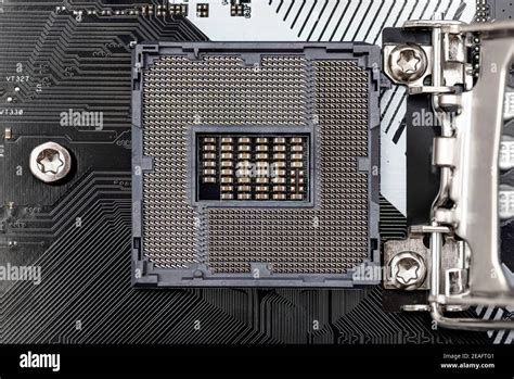 Top Macro Shot Of Empty Modern LGA Socket For CPU On Black Desktop Motherboard Stock Photo