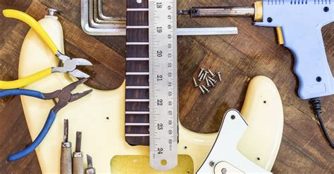 How To Properly Stretch Guitar Strings Basic Guitar Reverb News