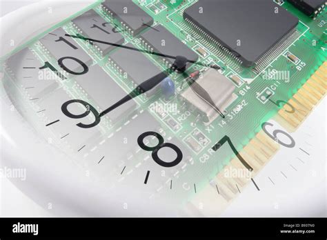 Clock And Circuit Board Stock Photo Alamy