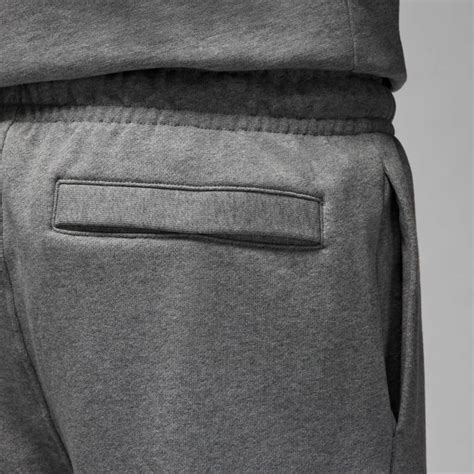 Buy Jordan Flight Fleece Mens Trousers Carbon Heather Nike Uae