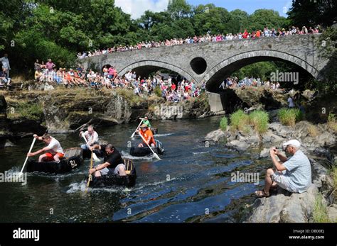 Coracle Men Competing In A Coracle Cwrwgl Race On The Teifi River At