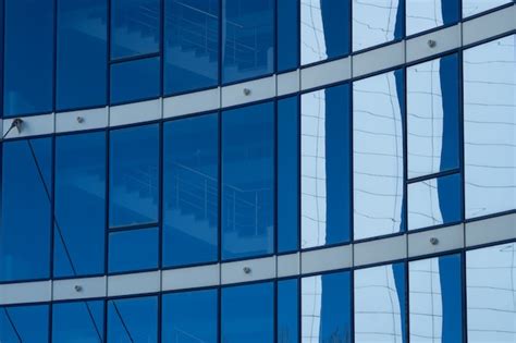 Premium Photo Facade Glass Tower With Blue Windows