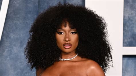 Megan Thee Stallion Pairs Rose Colored Glasses With Stunning Floral Ring Accented Bikini For