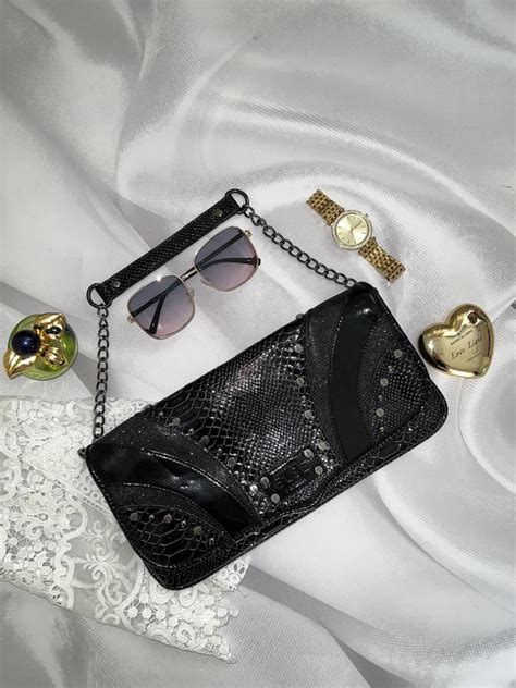 Крутій клатч — ціна 320 грн у каталозі Клатчі Купити аксесуари за доступною ціною на Шафі