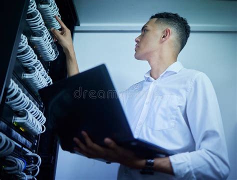 Man Laptop And Technician Work On Server Room Data Center Or Database Cables Check