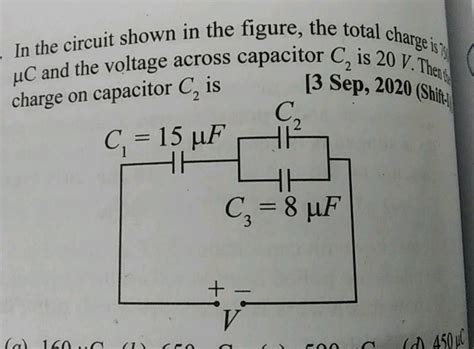 In the circuit shown in the figure the total charge is μC and the volta