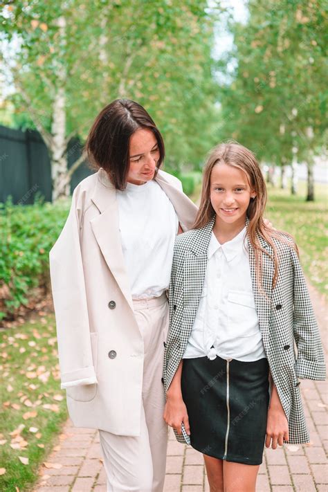 Premium Photo Mother And Her Daughter To School Adorable Little