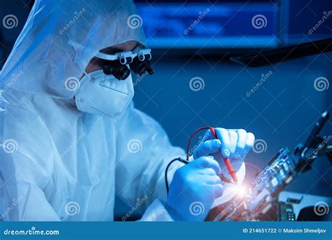 Microelectronics Engineer Works In A Modern Scientific Laboratory On Computing Systems And