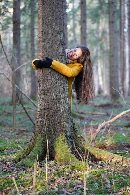 Premium Photo Full Length Of Woman With Tree Trunk In Forest Premium Photo Full Length Of Woman With Tree Trunk In Forest