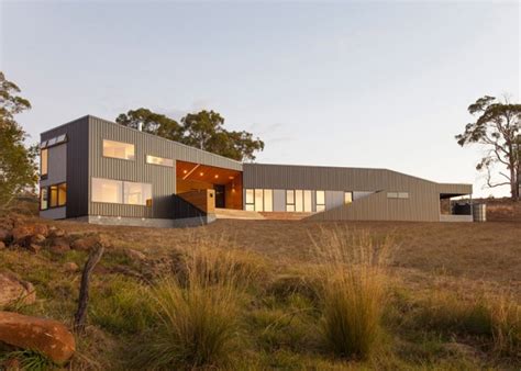 Rural Tasmanian House Has A Terrace Piercing Its Middle