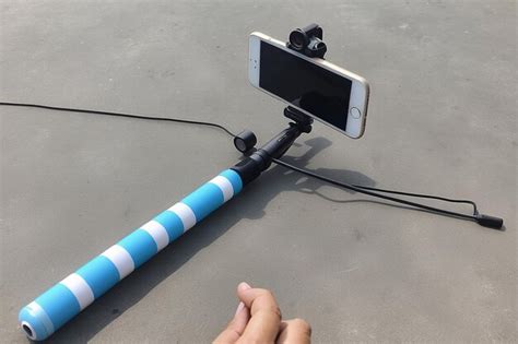 Premium Photo Blue And White Strip Selfie Stick