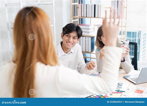Creative Team Collaborating On Ux Ui Design Project In Modern Office Environment Stock Image