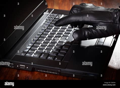 Man Stealing Data From A Laptop Stock Photo Alamy