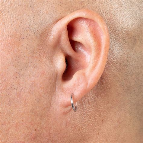 Which Side To Wear An Earring For Men The Meaning Behind Each Choice