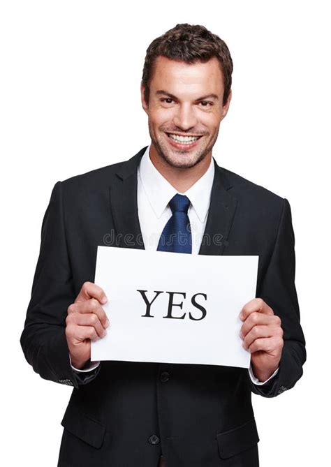 His Attitude Is What Sets Him Apart A Handsome Young Businessman Holding A Placard With Yes On