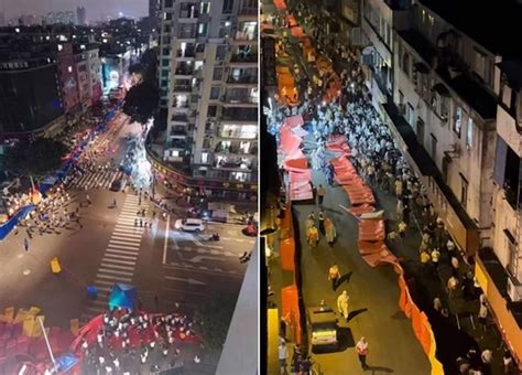 Photo Gallery ชมภาพ คลิป ผู้อาศัยในกว่างโจวพังรั้วกั้นเขตล็อกดาวน์ ขณะผู้ติดเชื้อโควิดในเมือง