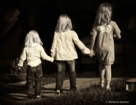 Three Sisters Holding Hands