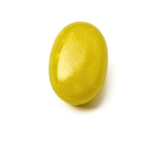 Premium Photo A Yellow Egg With A Yellow Shell On It
