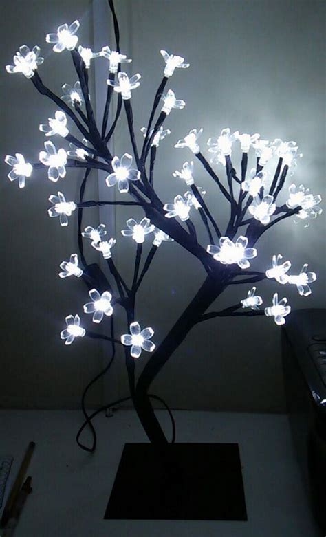 دکوراسیون رویایی اتاق خواب با چراغ خواب های درختی ماگرتا