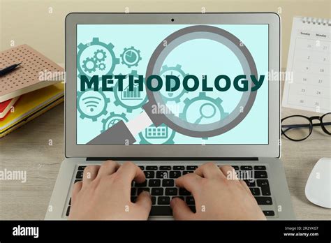 Methodology Concept Woman Using Modern Laptop At Table Indoors