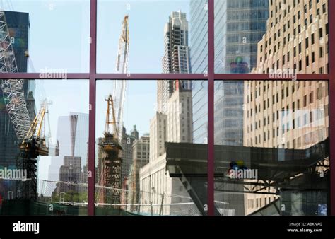 Abstract View Of Ground Zero Seen Through The Reflection In A Glass Window Across From Site